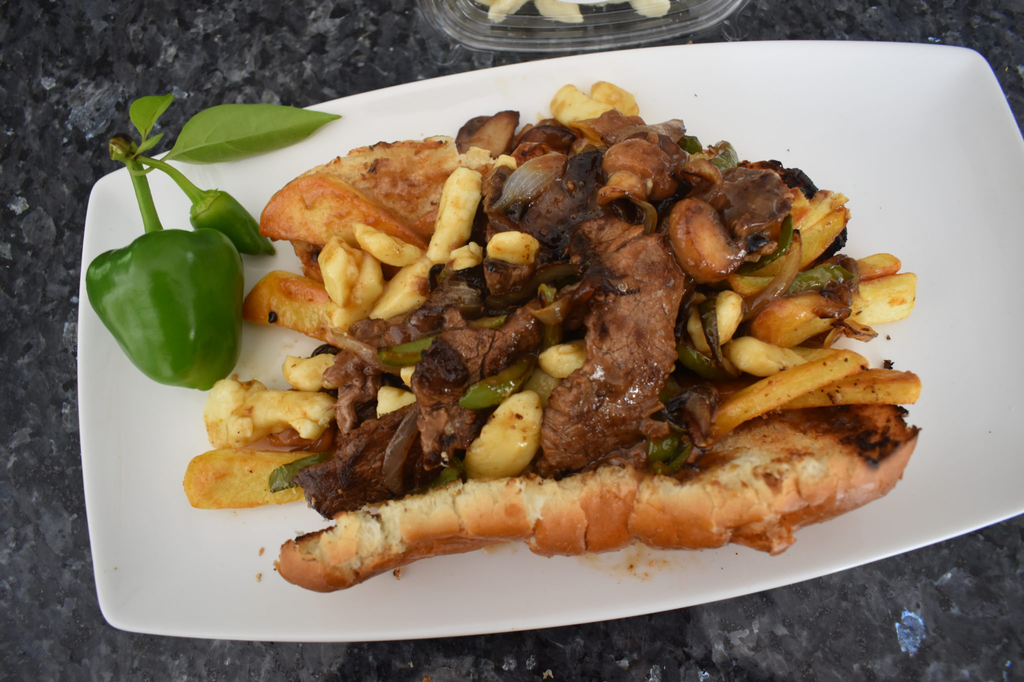 STEAK AND CHEESE POUTINE - Pineland Farms Dairy